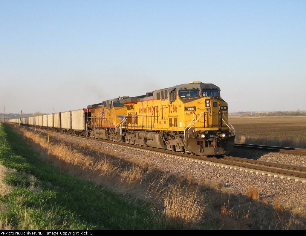 UP 7086 Leads Coal Empties WB